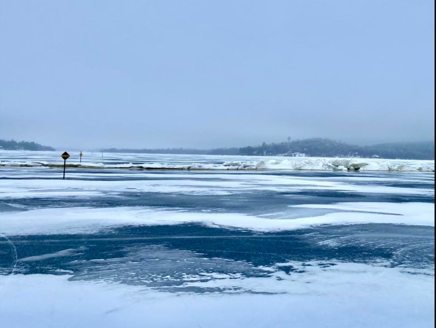 Snowmobiles go through the ice on Lake Vermilion